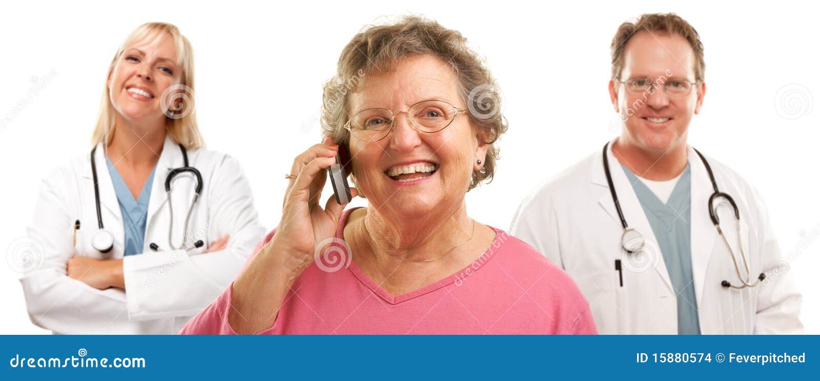Senior Woman Using Cell Phone and Doctors Behind Stock Photo - Image of ...