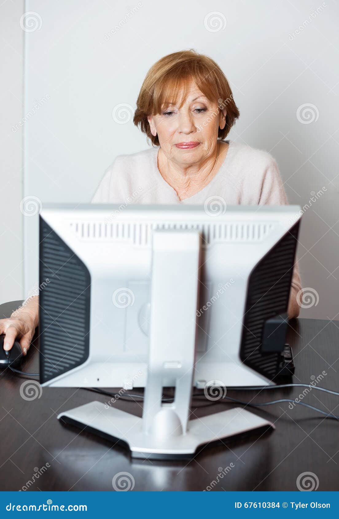 Senior Woman Using Computer in Class Stock Photo - Image of ...
