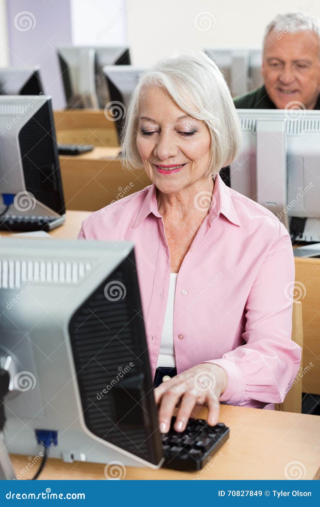 Senior Woman Using Desktop PC in Class Stock Image - Image of casual ...
