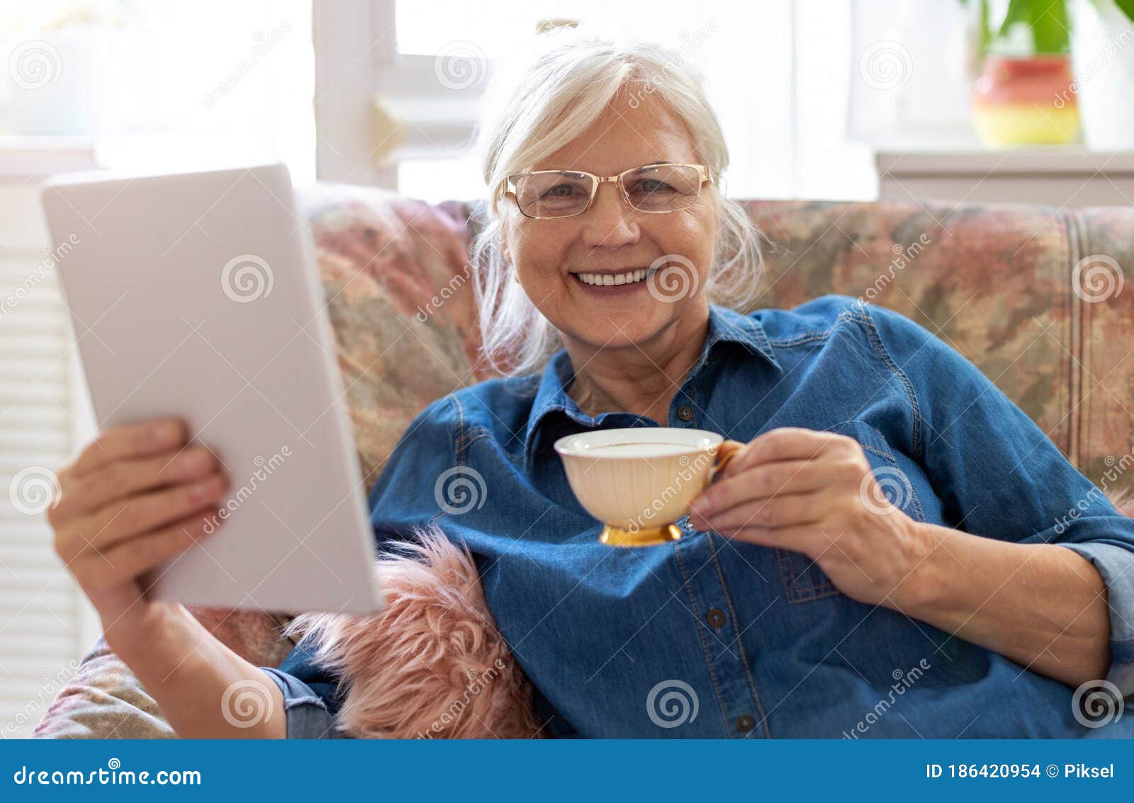 Senior Woman Using Digital Tablet Stock Photo - Image of health ...
