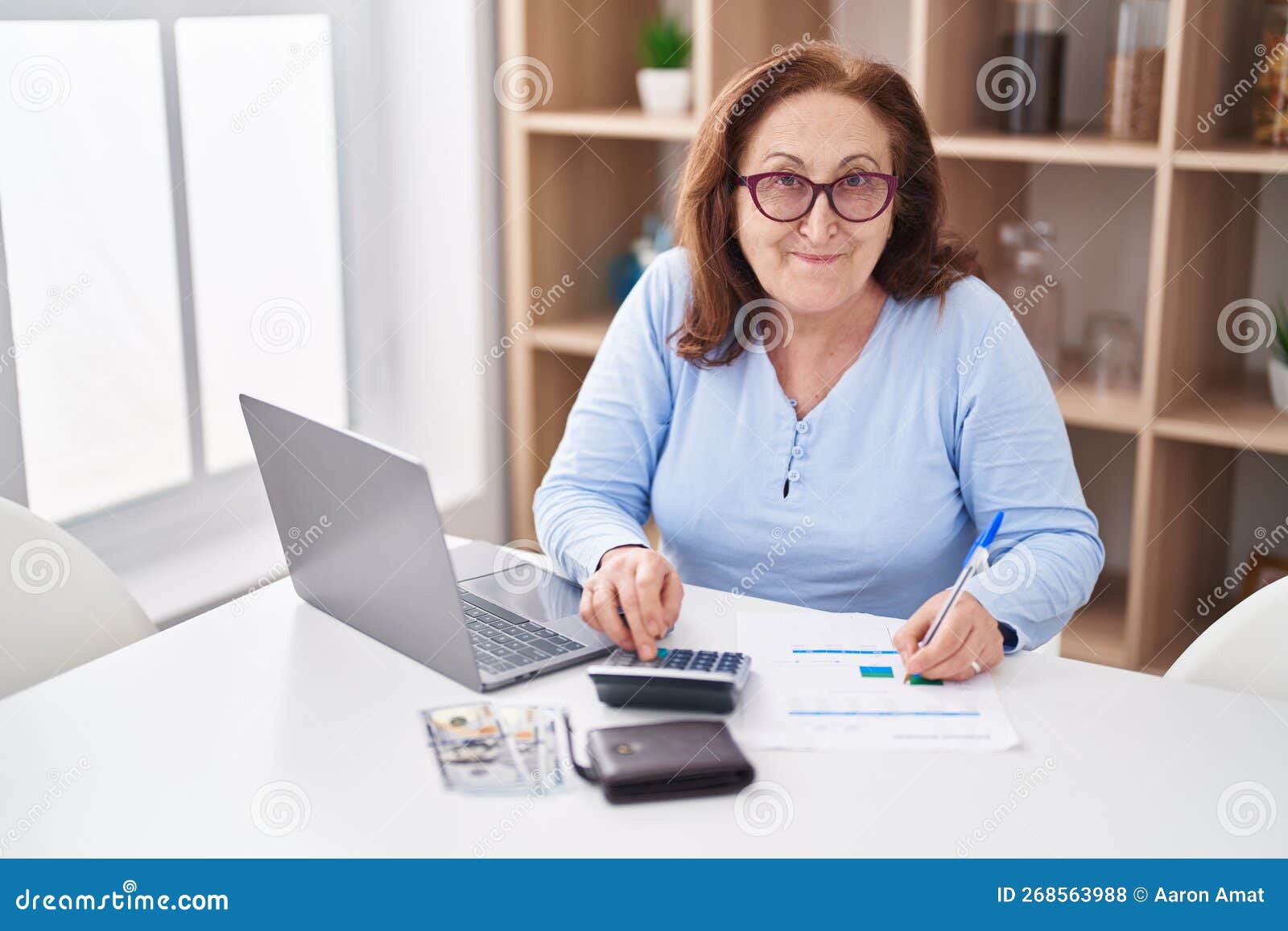 Senior Woman Using Laptop Accounting at Home Stock Photo - Image of ...