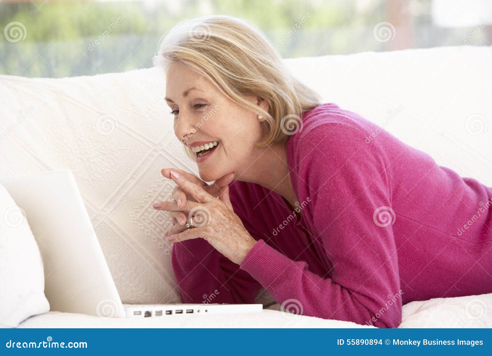 Senior Woman Using Laptop at Home Stock Photo - Image of person, laptop ...
