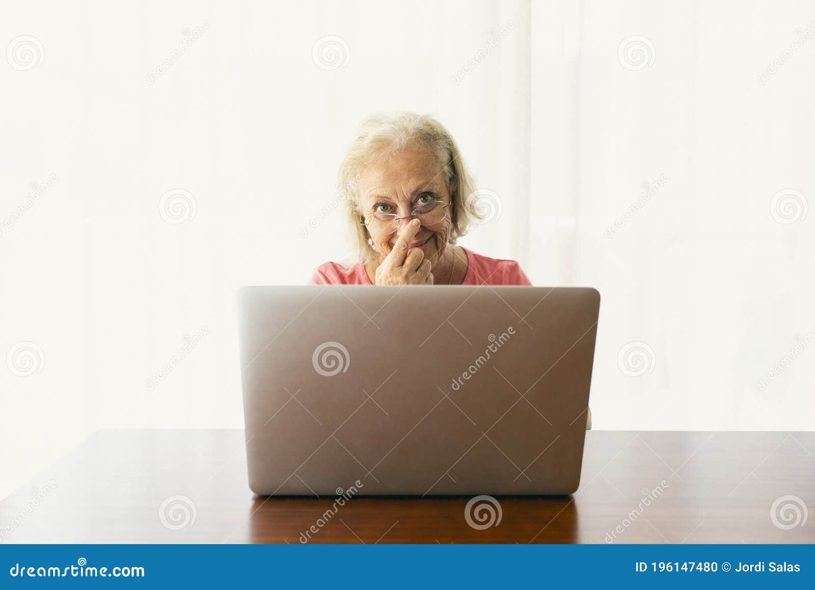 Senior Woman Using Laptop at Home Stock Photo - Image of device ...