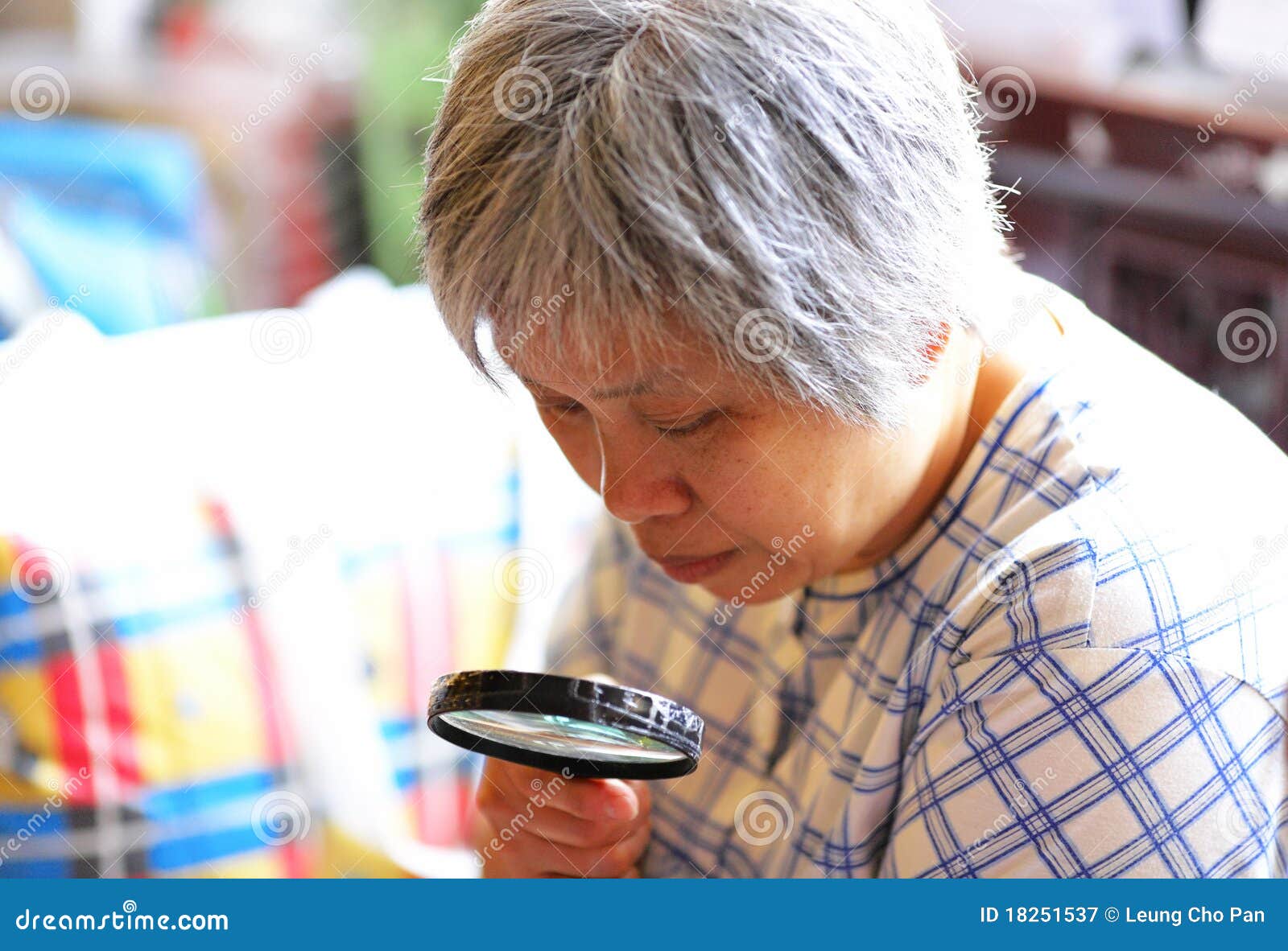 Senior Woman Using Magnifier Stock Image - Image of magnify, middleage ...