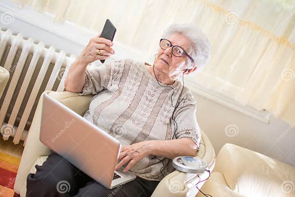 Senior Woman Using Modern Technology Stock Image - Image of granny ...