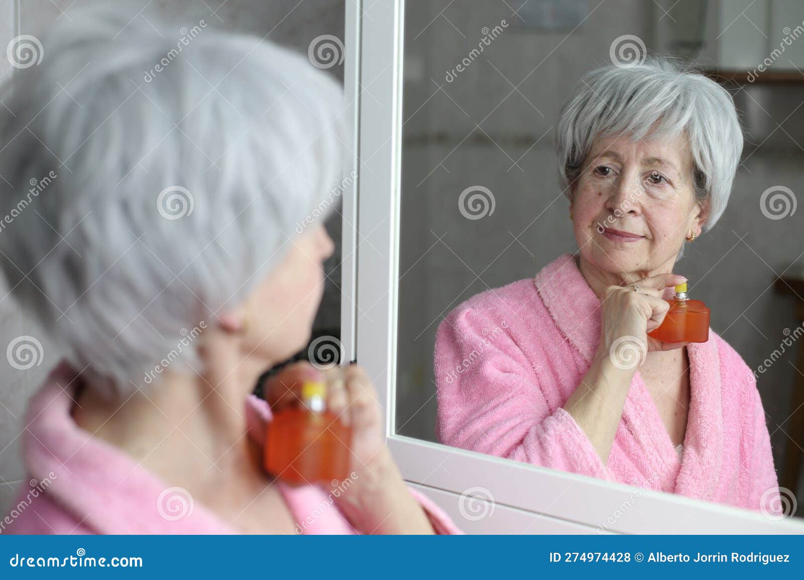 Senior Woman Using Perfume in the Bathroom Stock Photo - Image of adult ...