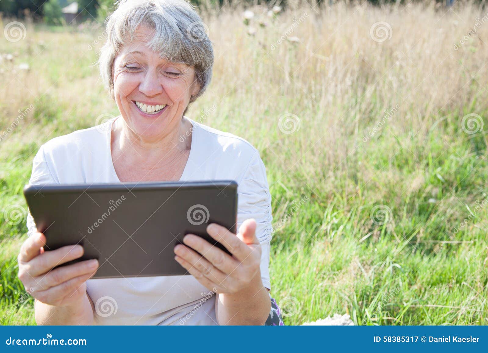Senior Woman Using Tablet Device Stock Image - Image of tablet ... Senior Woman Using Tablet Device Stock Image - Image of tablet ...