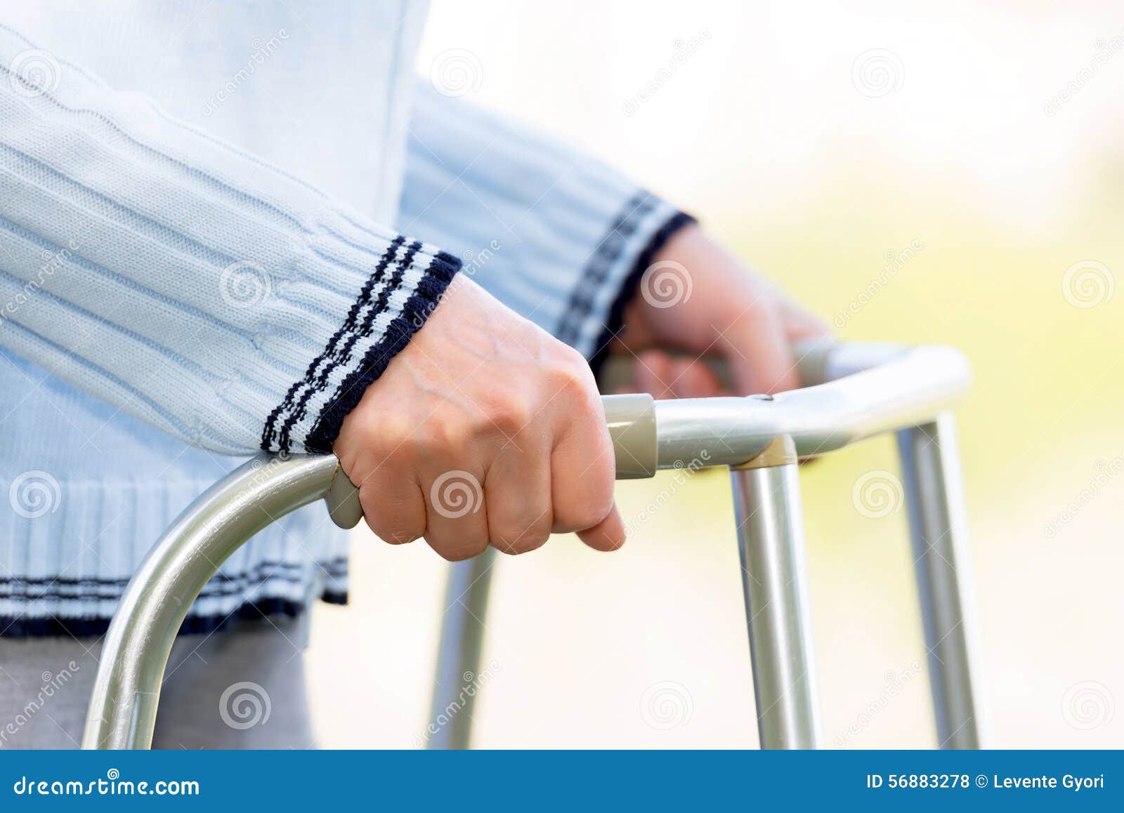 Senior Woman Using a Walker Stock Photo - Image of aged, disabled: 56883278