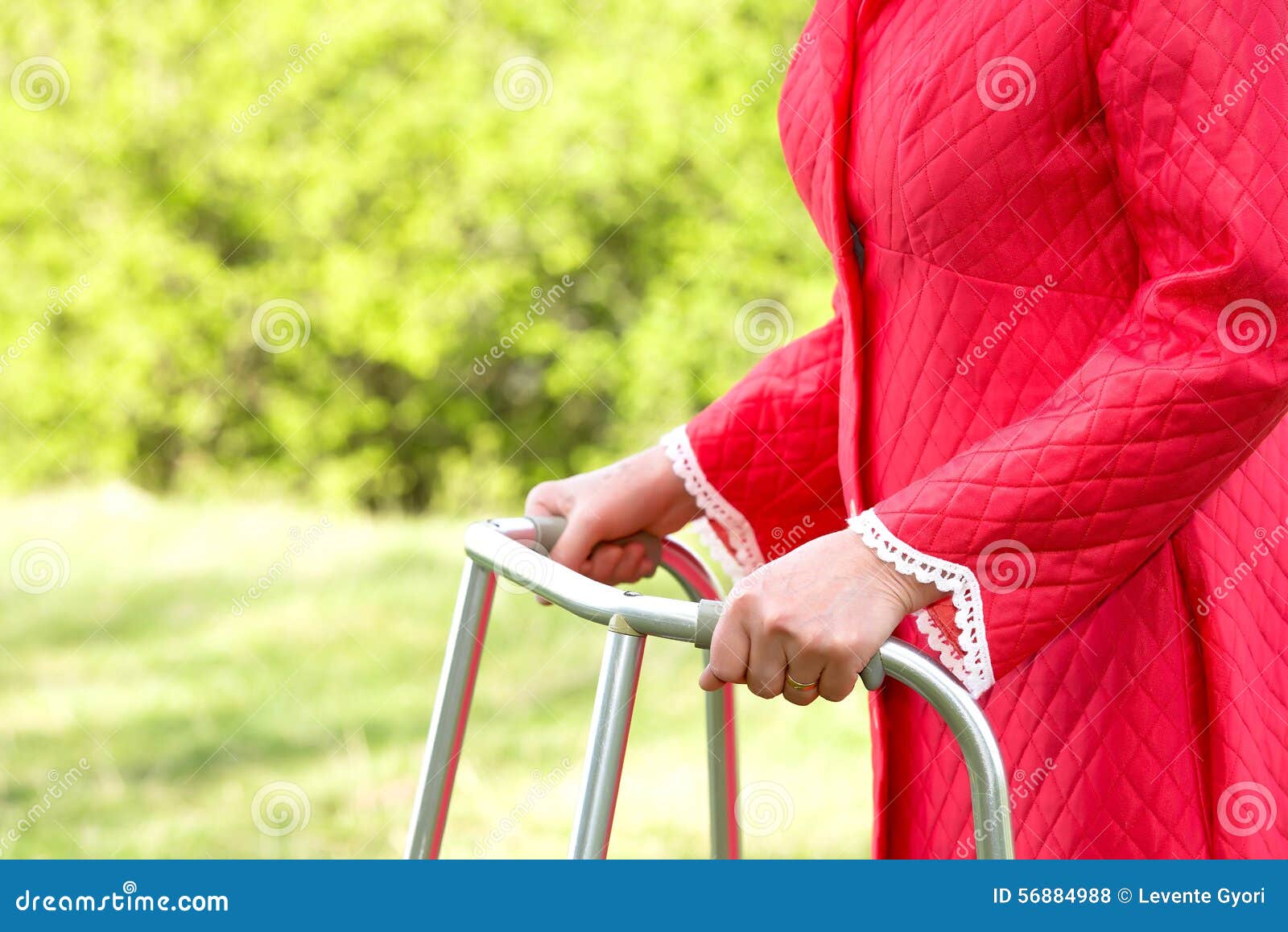 Senior Woman Using a Walker Stock Photo - Image of handicap, caregiver ...