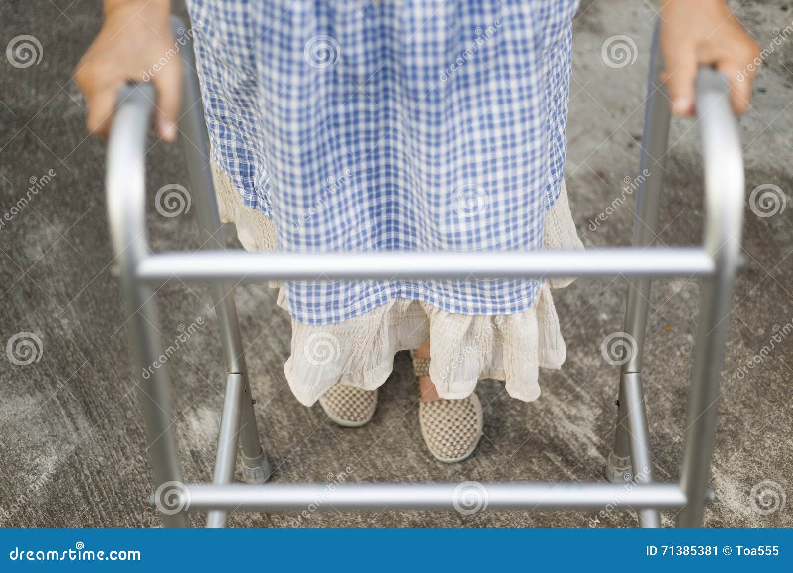 Senior Woman Using a Walker on Walk Way. Stock Image - Image of older ...