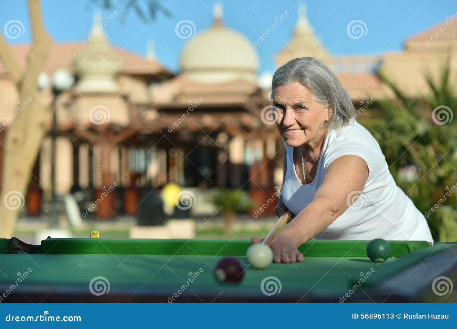 Senior Woman on Vacation Playing Billiards Stock Image - Image of ...