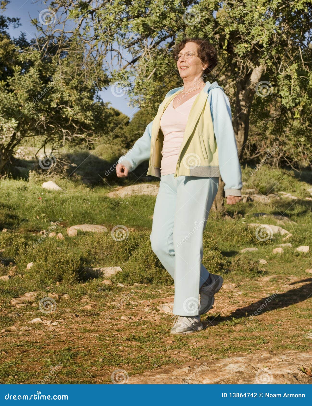 Senior woman walking stock photo. Image of happy, outside - 13864742
