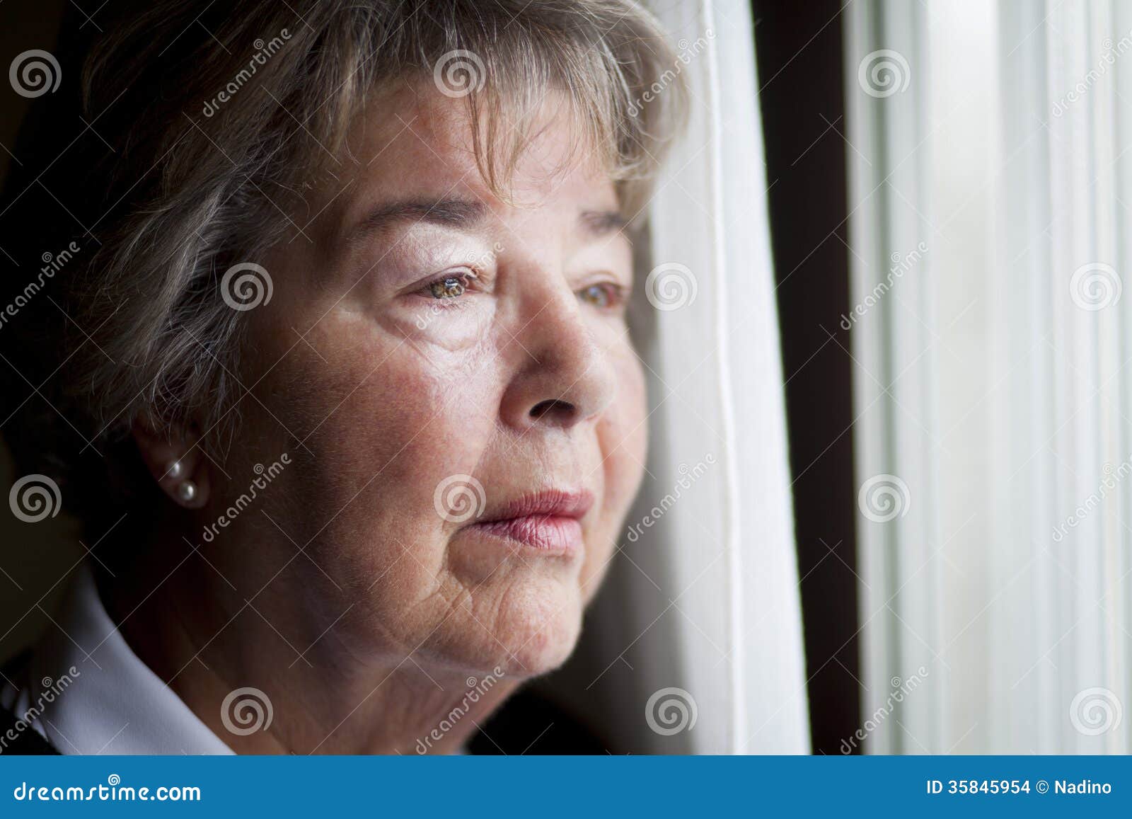 Senior Woman at the Window stock photo. Image of disappointment - 35845954