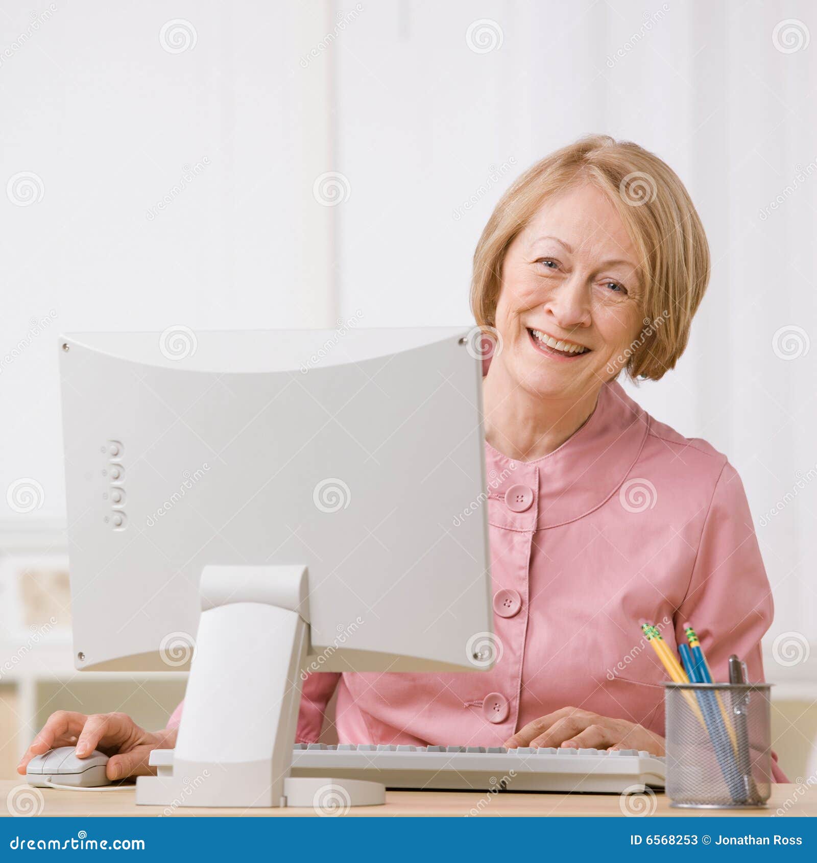 Senior Woman Working on Computer at Desk Stock Image - Image of glad ...