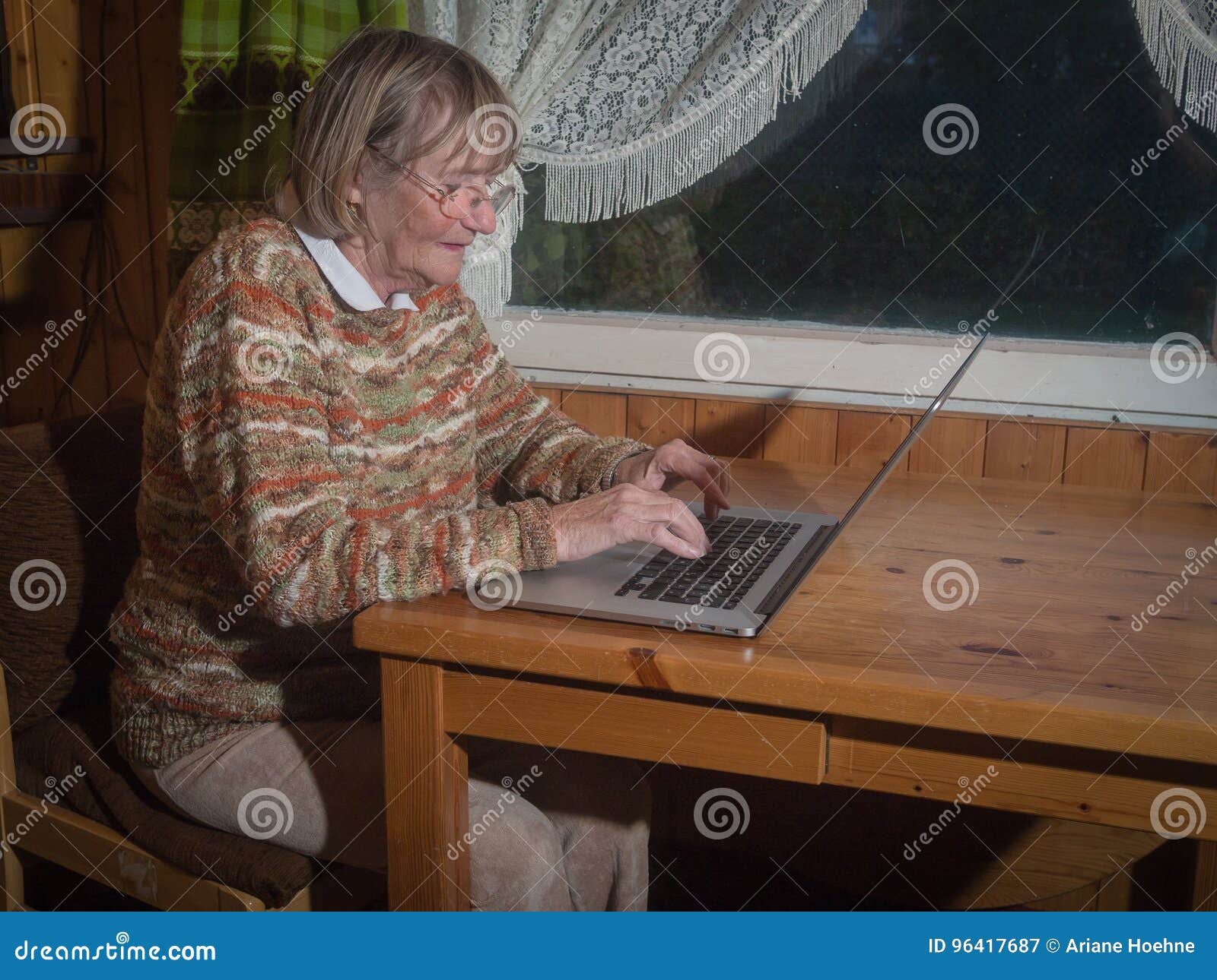 Senior Woman Working on Laptop Computer. Stock Image - Image of ...