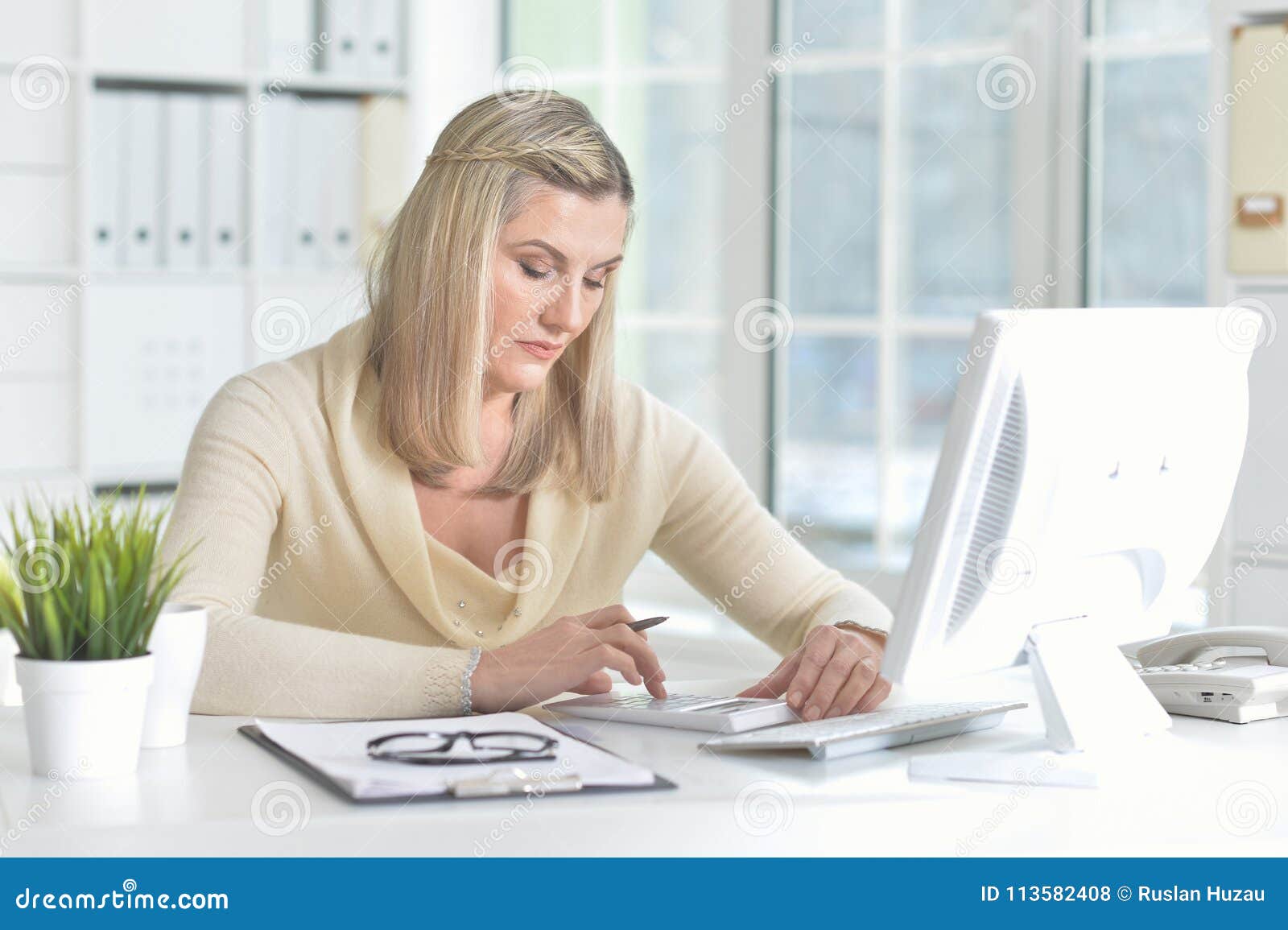 Senior Woman Working at Table with Computer Stock Photo - Image of ...