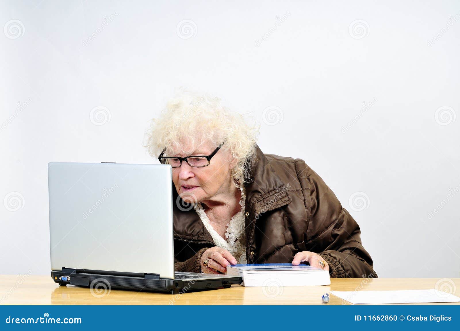 Senior woman with computer stock photo. Image of people - 11662860