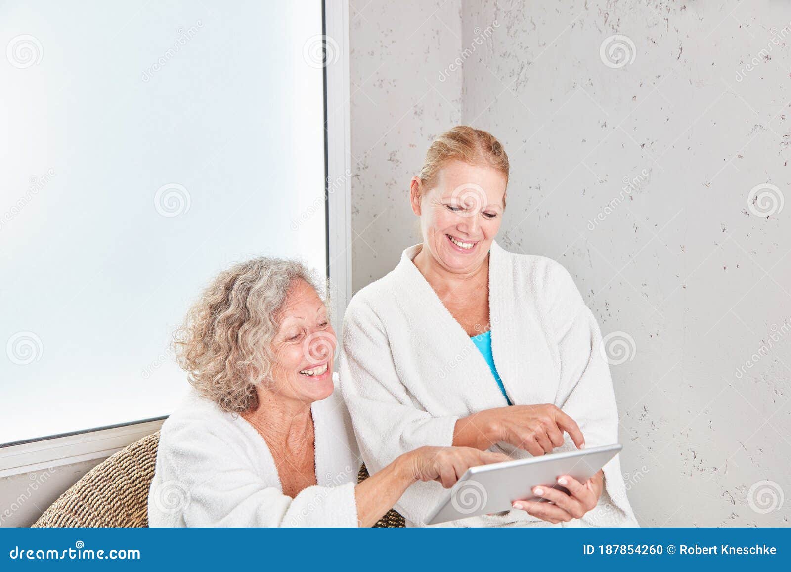 Senior Women Using Tablet Computer at the Spa Stock Photo - Image of ...