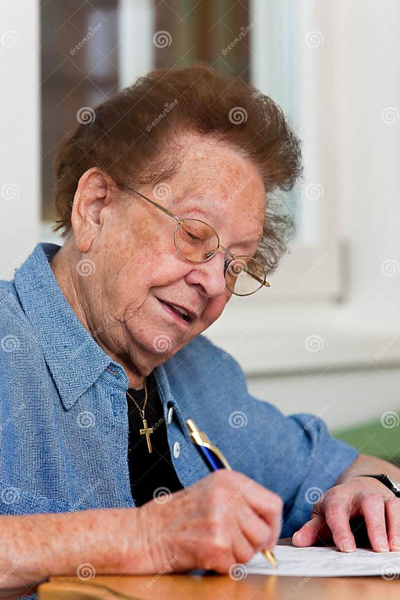 Senior writes a letter stock image. Image of pensioners - 8138095