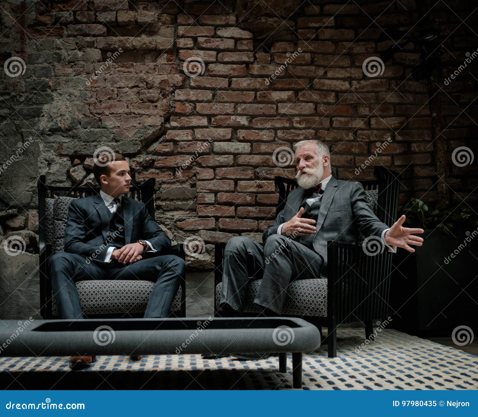 Senior and Young Gentlemen Having Conversation Stock Image - Image of ...