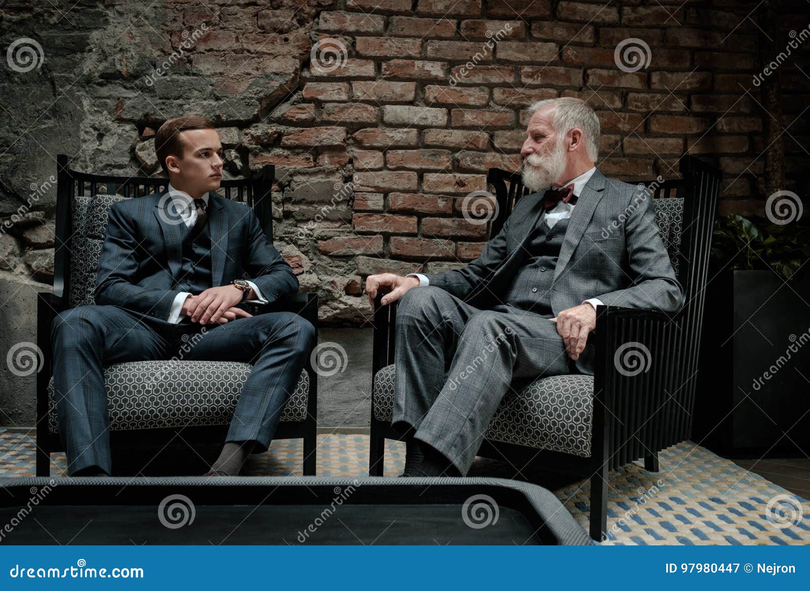 Senior and Young Gentlemen Having Conversation Stock Image - Image of ...