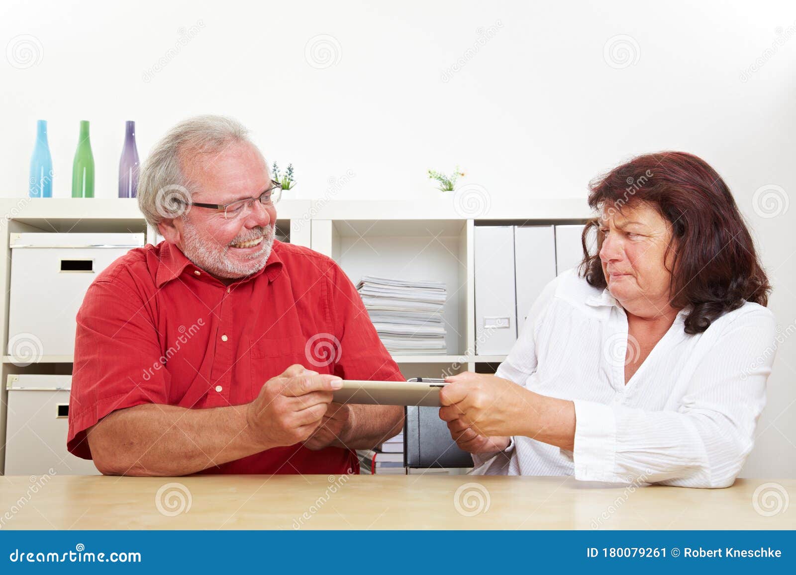 Seniors Argue about Tablet Computers Stock Image - Image of couple ...