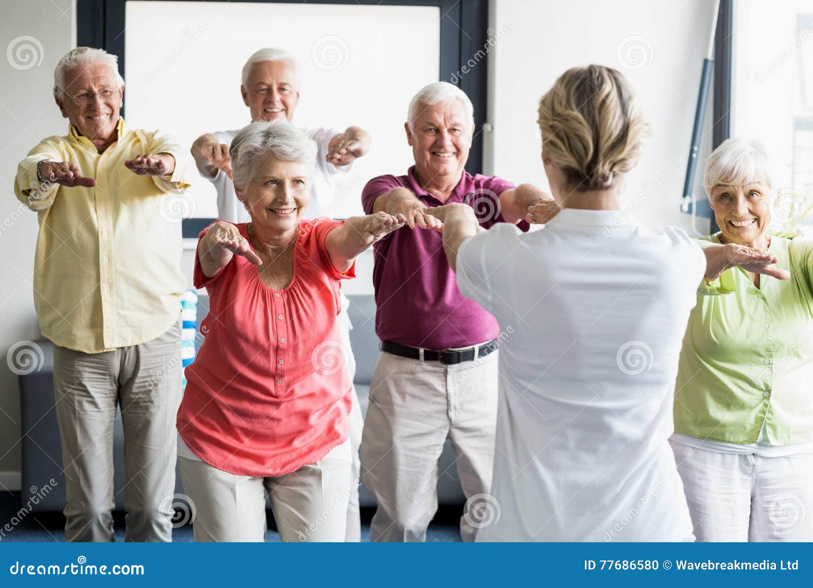 Seniors doing exercises stock photo. Image of clinic - 77686580
