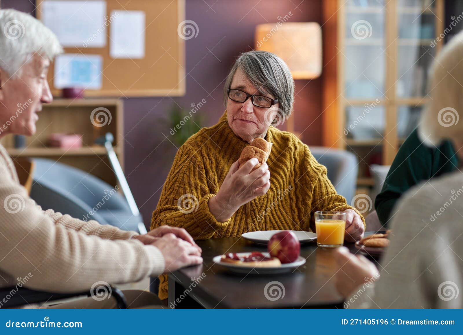 Seniors Enjoying Lunch at Common Table in Retirement Home Stock Photo ...