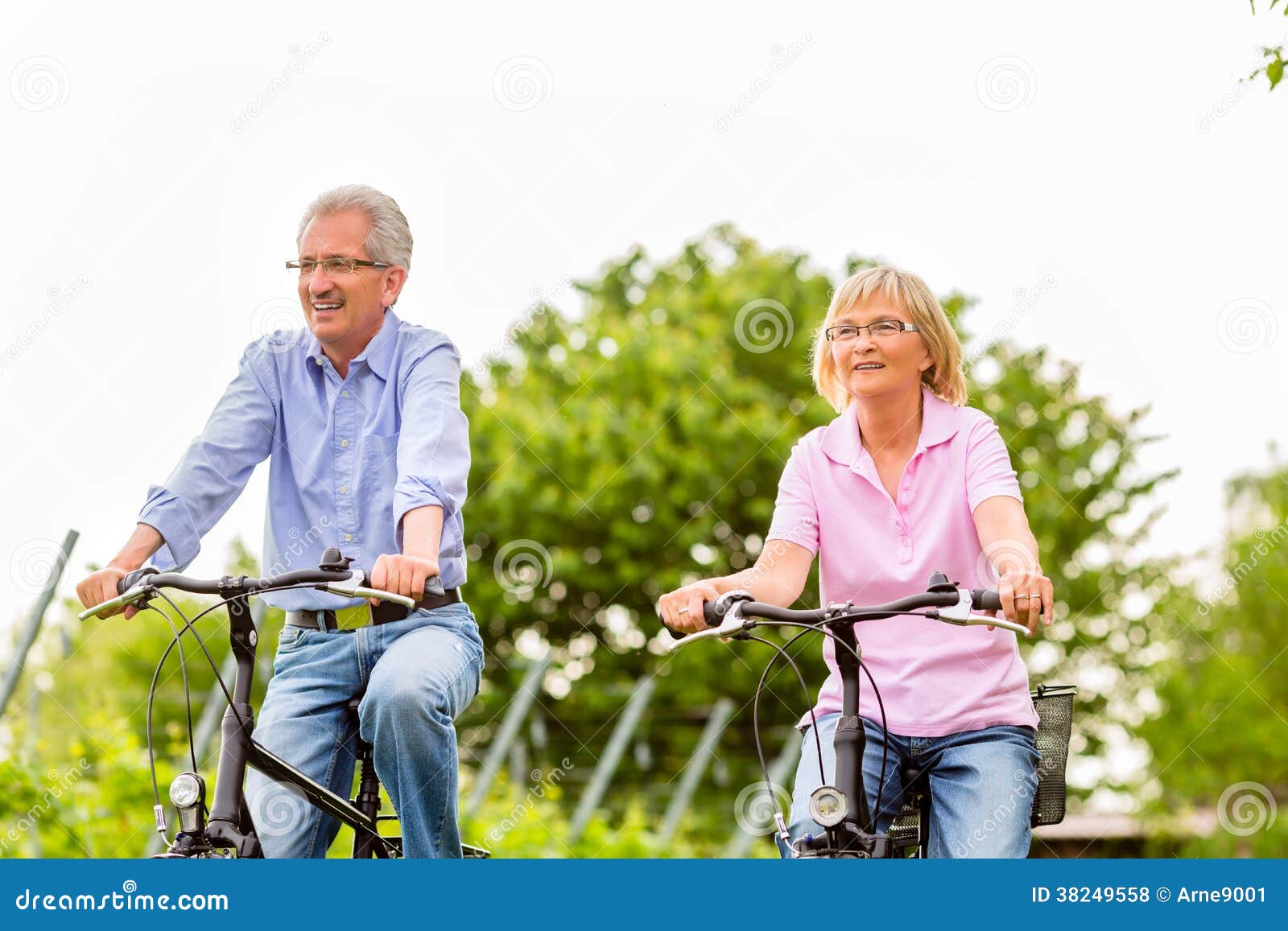 Seniors Exercising with Bicycle Stock Photo - Image of male, path: 38249558