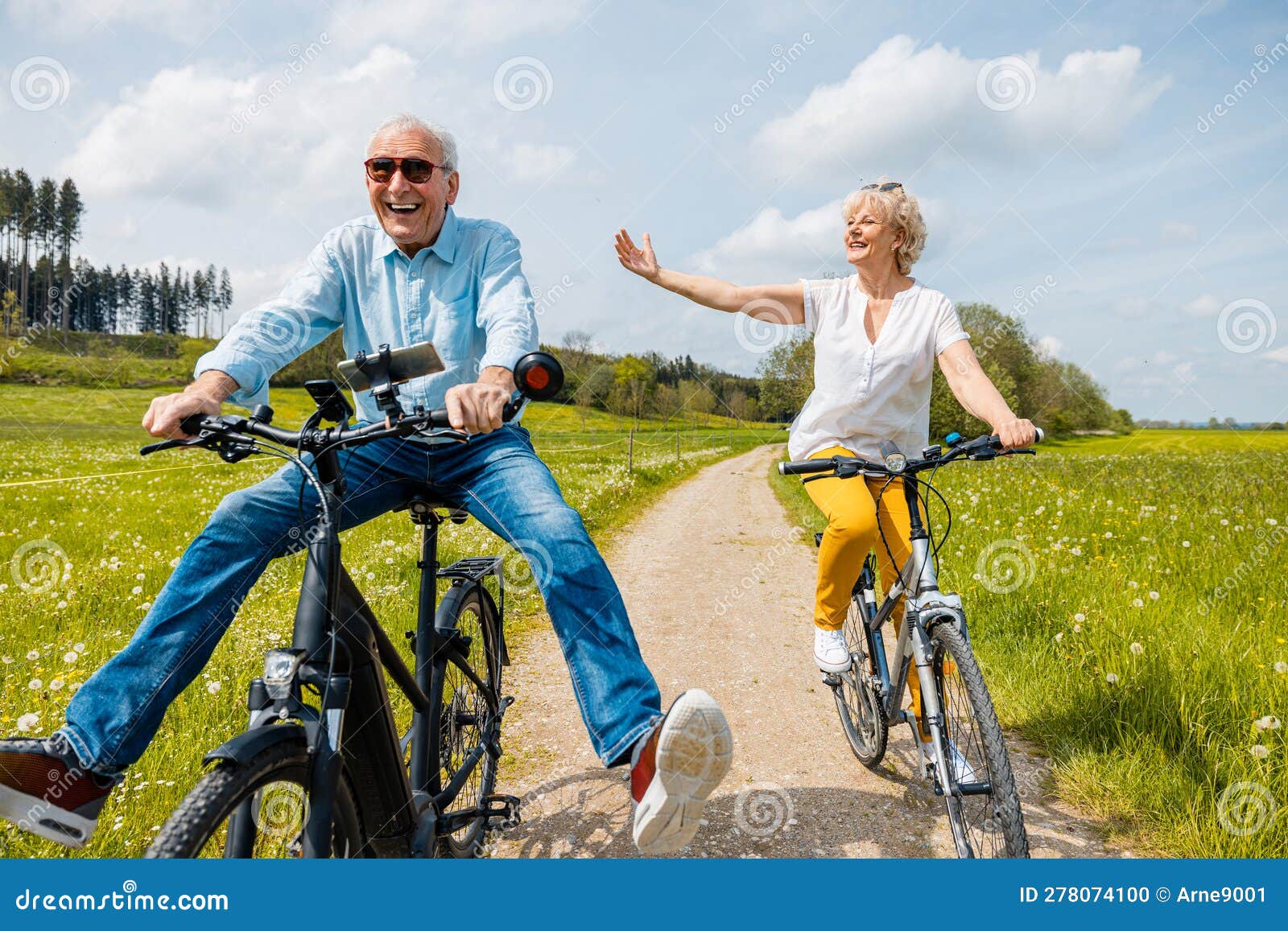 Seniors Having Fun on Bicycles in Spring Stock Photo - Image of ...