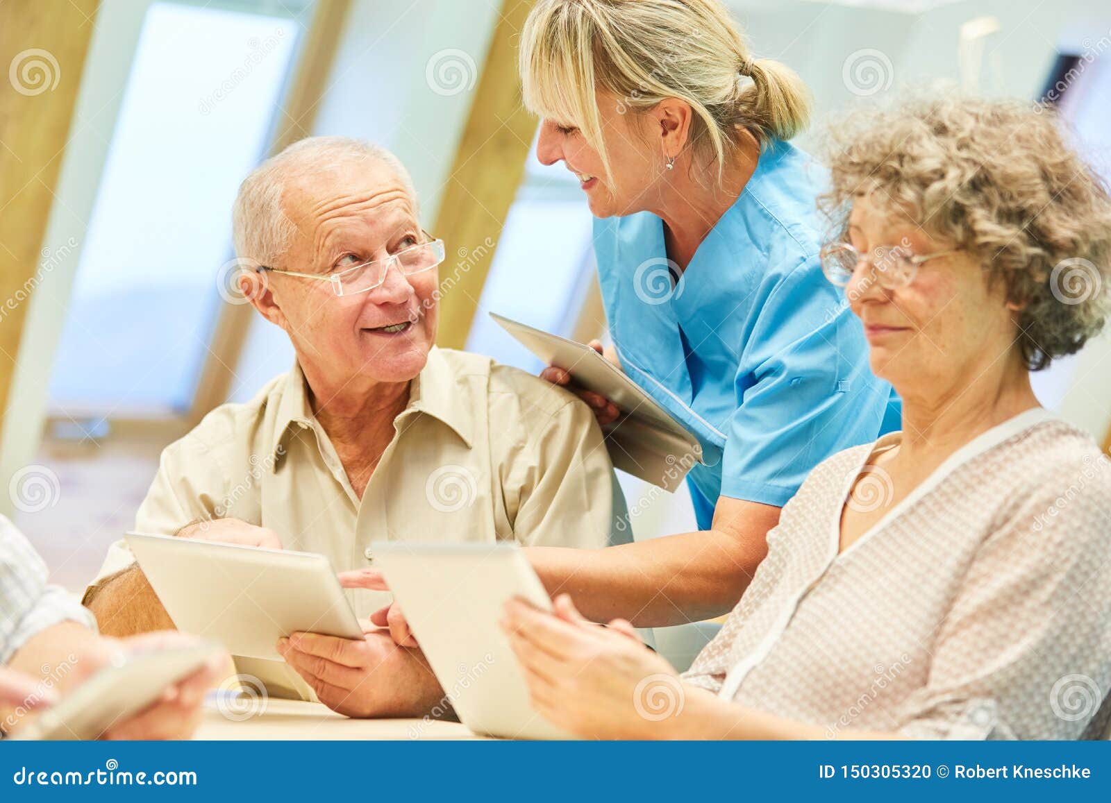 Seniors Learn with the Tablet in the Computer Course Stock Photo ... Seniors Learn with the Tablet in the Computer Course Stock Photo ...