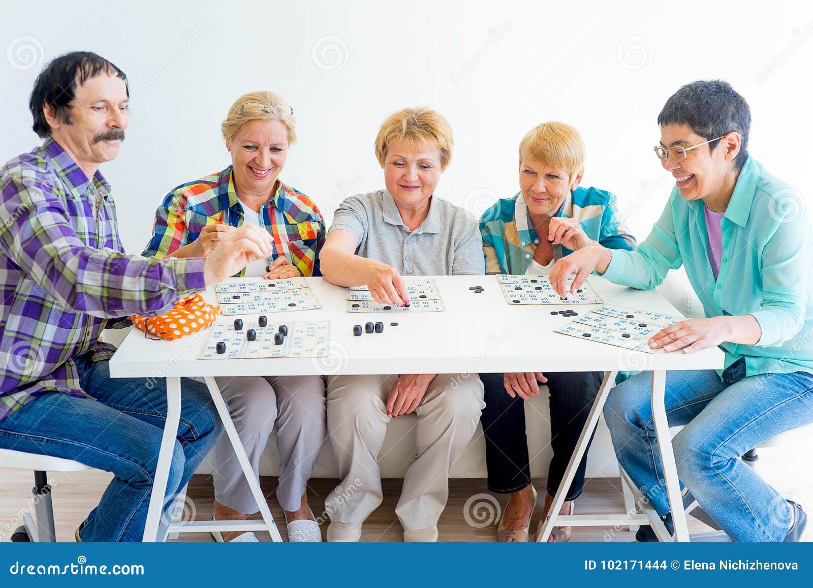 Seniors playing bingo stock photo. Image of leisure - 102171444