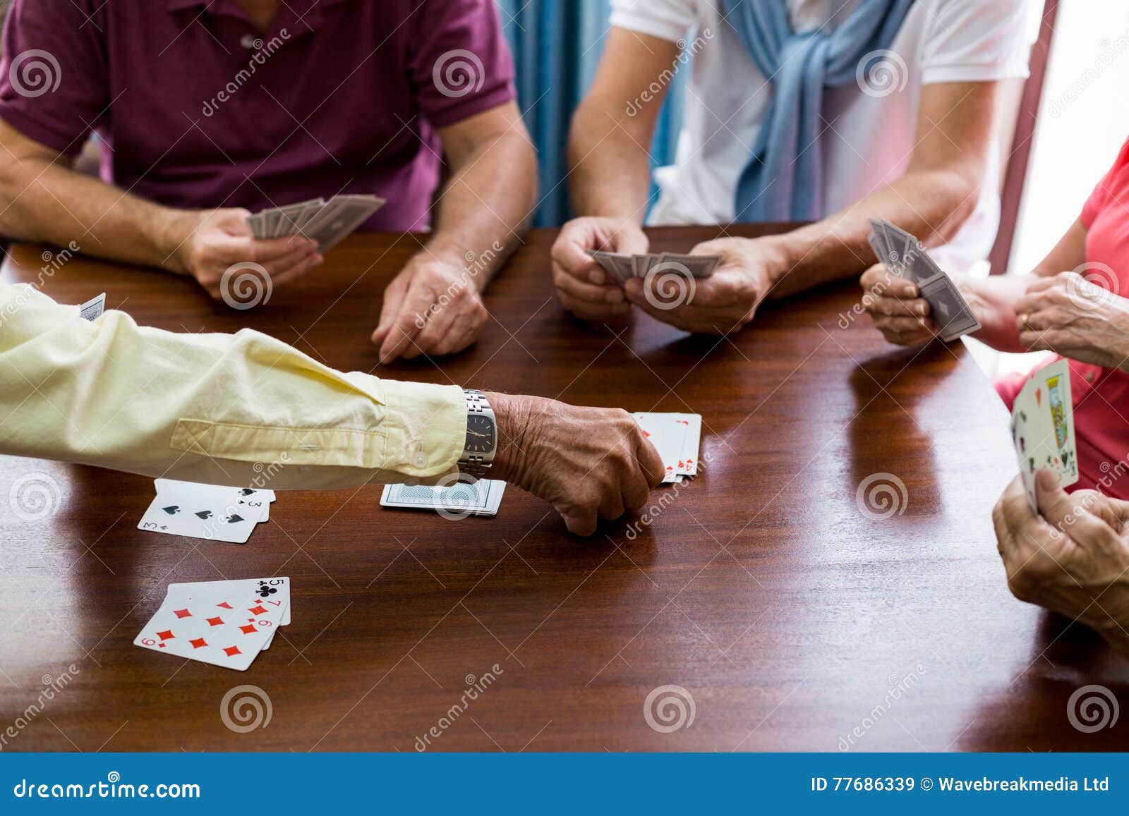 Seniors playing cards stock image. Image of cards, daycare - 77686339