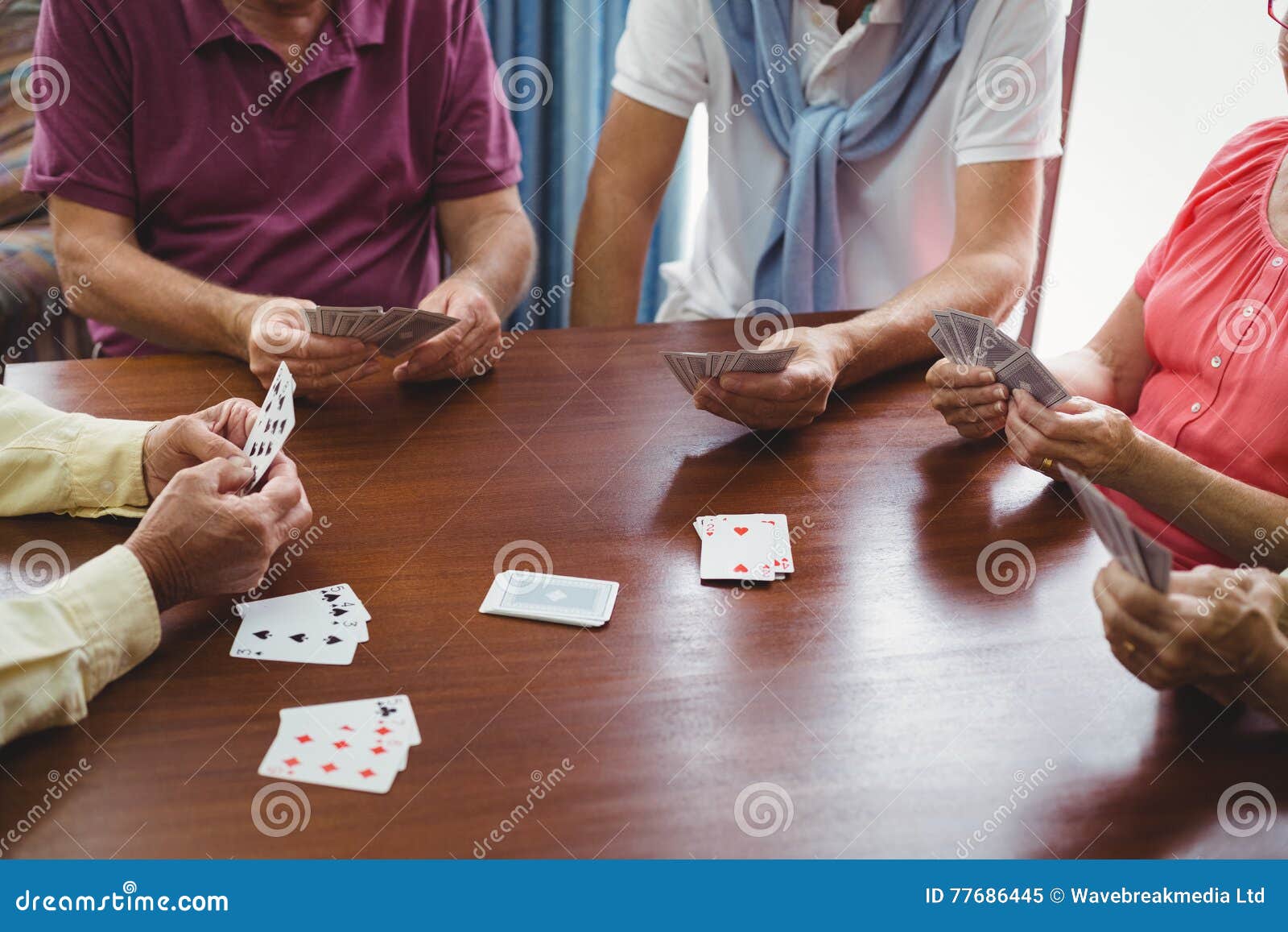 Seniors playing cards stock image. Image of healthcare - 77686445
