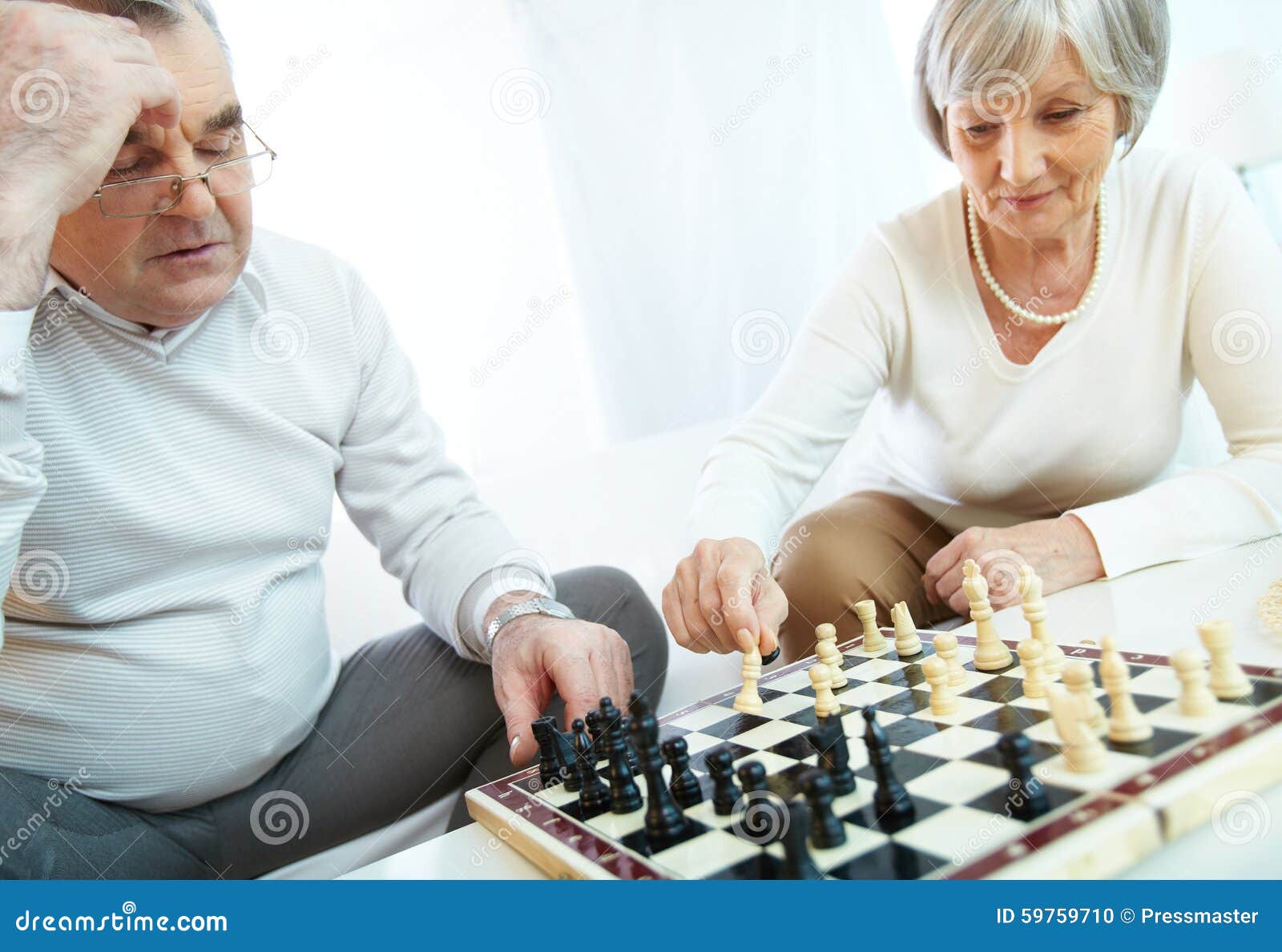 Seniors playing chess stock photo. Image of leisure, aged - 59759710