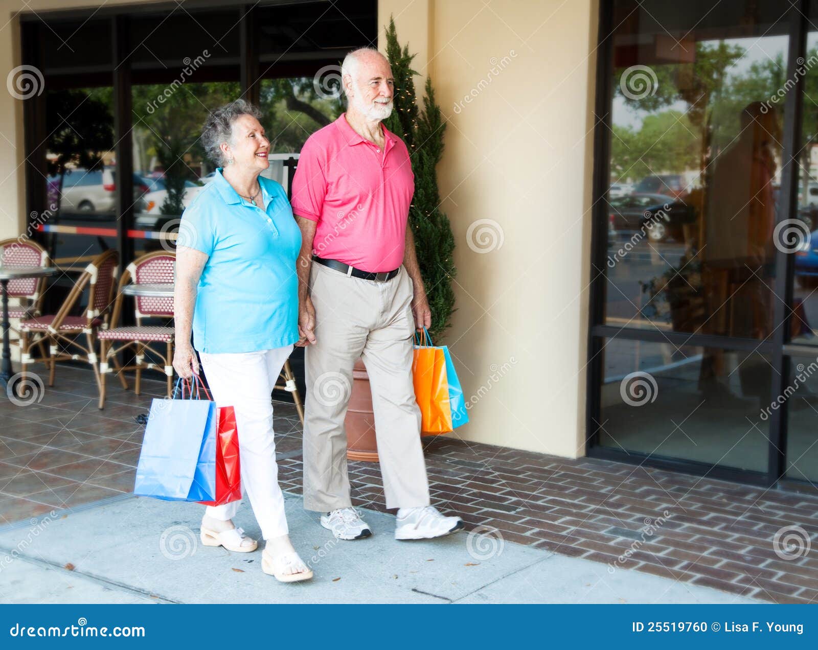 Seniors at Shopping Center stock photo. Image of holding - 25519760