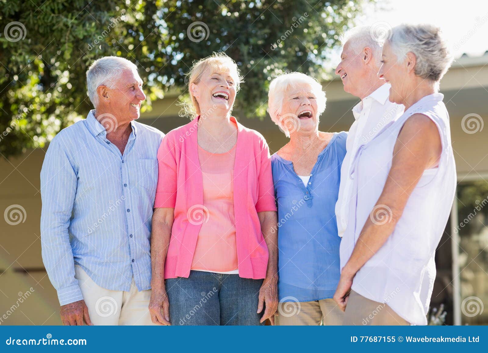 Seniors standing together stock image. Image of fondness - 77687155