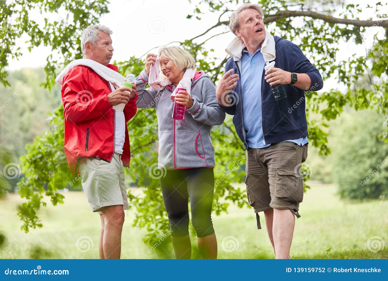 Seniors Take a Break on the Hike Stock Photo - Image of refreshment ...