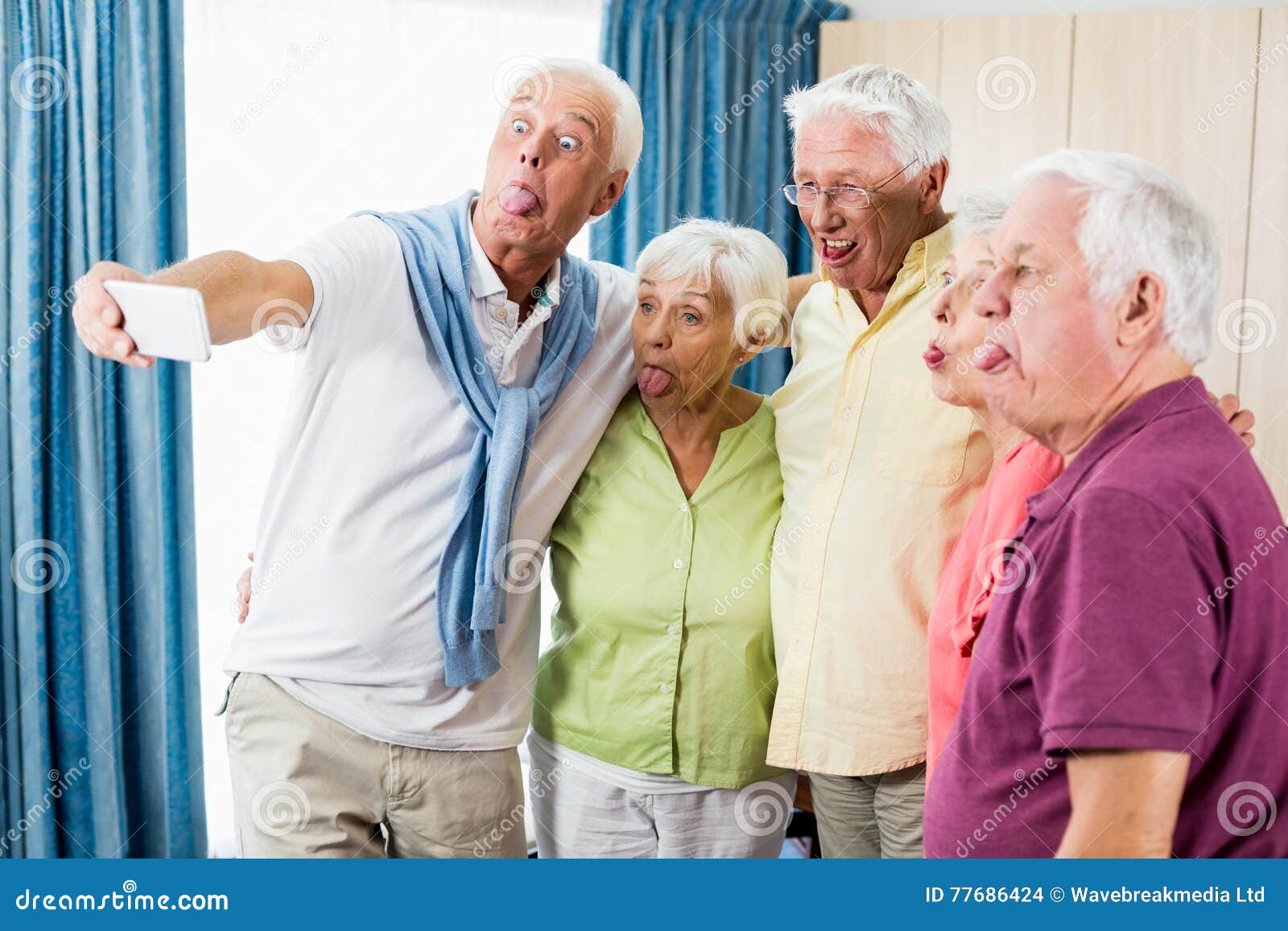 Seniors taking a selfie stock photo. Image of friendship - 77686424