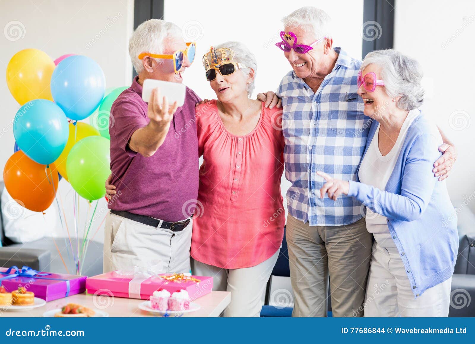 Seniors taking a selfie stock photo. Image of cheerful - 77686844