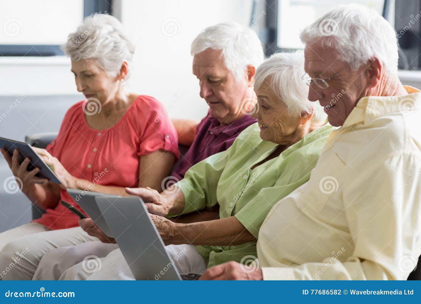 Seniors using tablets stock photo. Image of casual, friendliness - 77686582