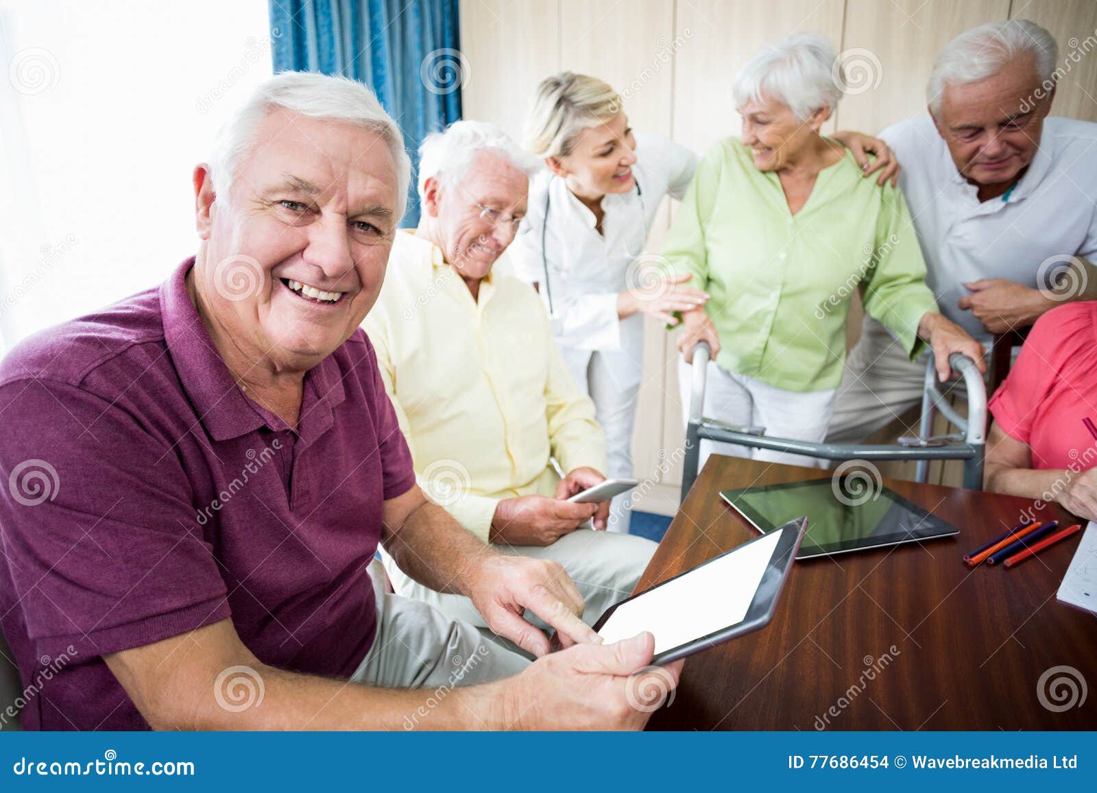 Seniors using technology stock photo. Image of citizen - 77686454