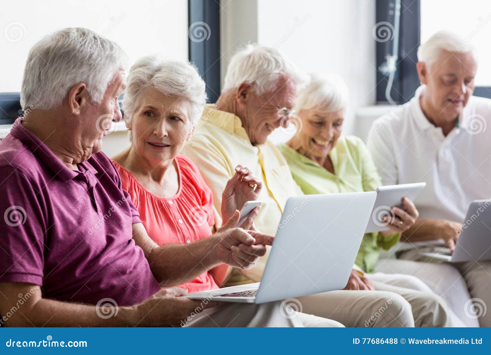 Seniors using technology stock photo. Image of leisure - 77686488