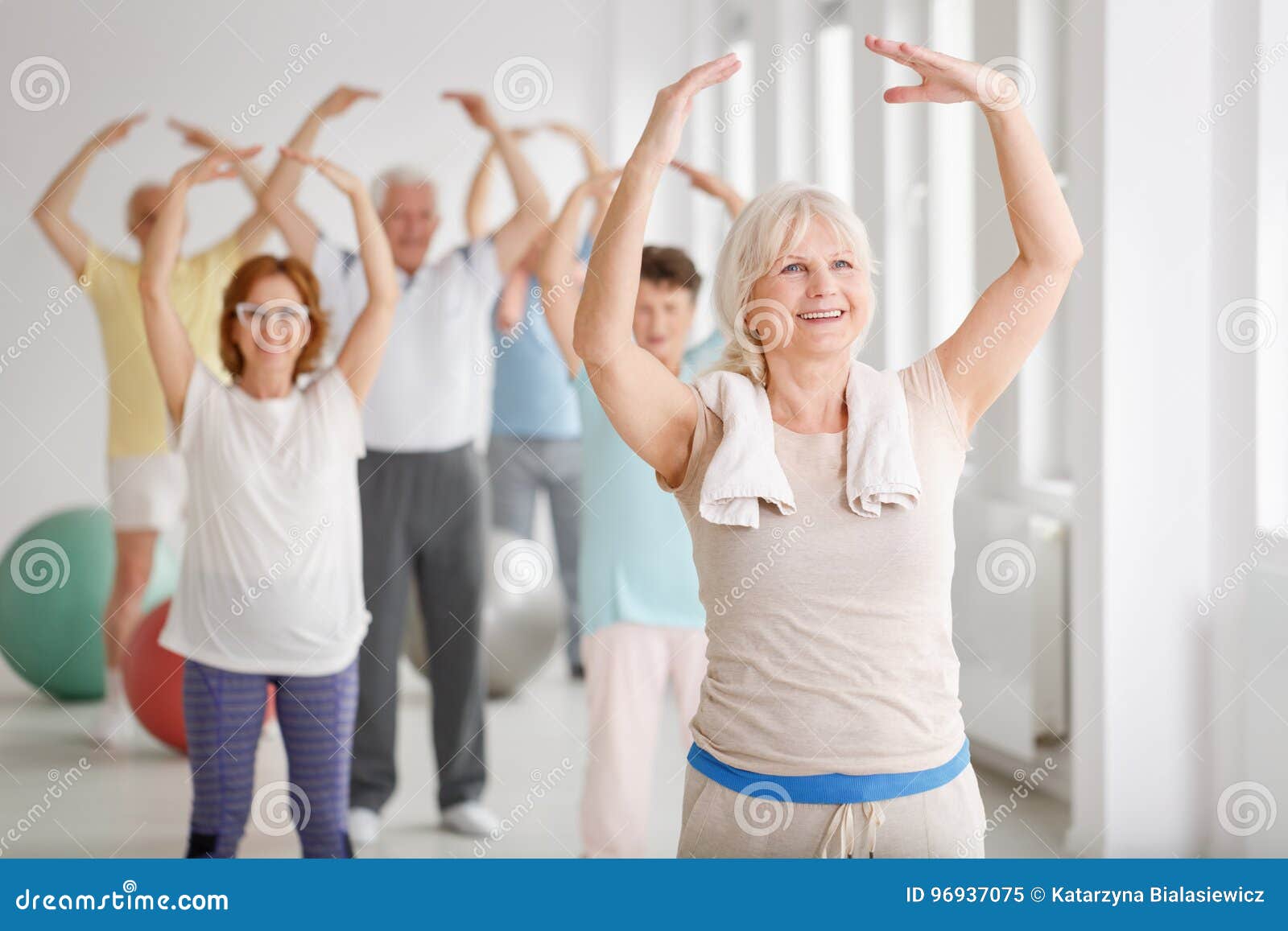 Seniors during warm-up stock image. Image of active, friendship - 96937075
