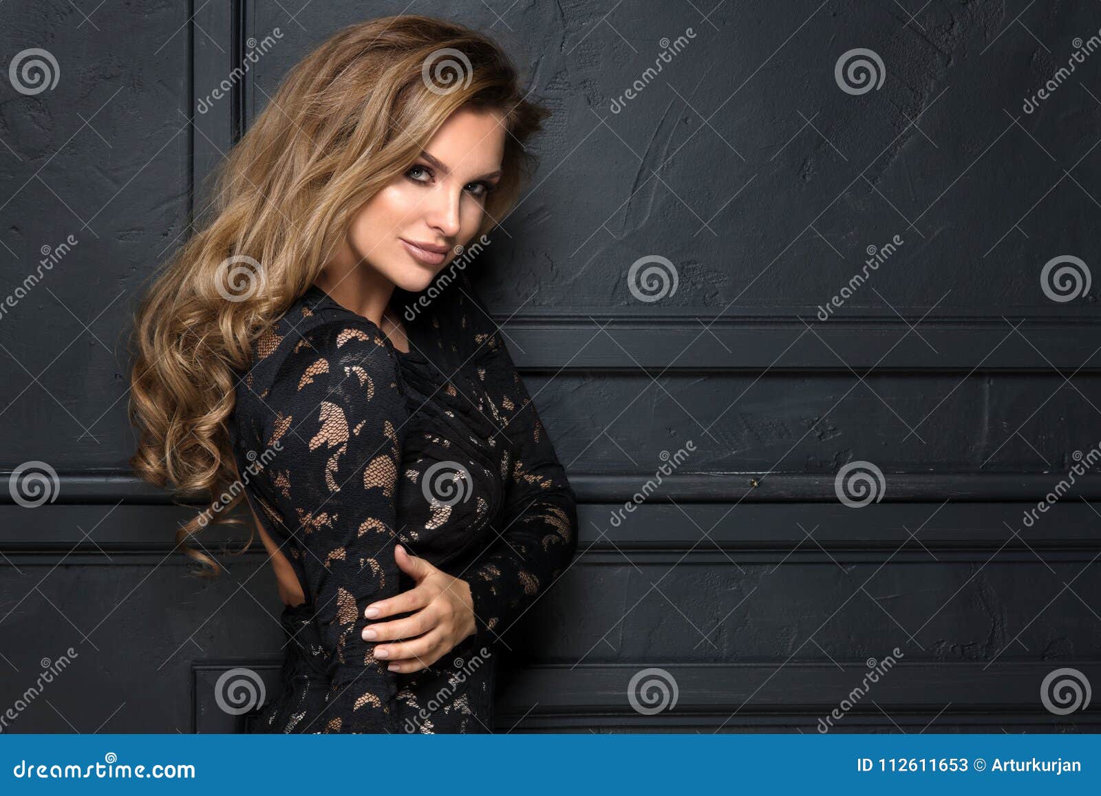 Sensual Beautiful Blonde Woman Posing in Black Dress. Stock Image ... Sensual Beautiful Blonde Woman Posing in Black Dress. Stock Image ...