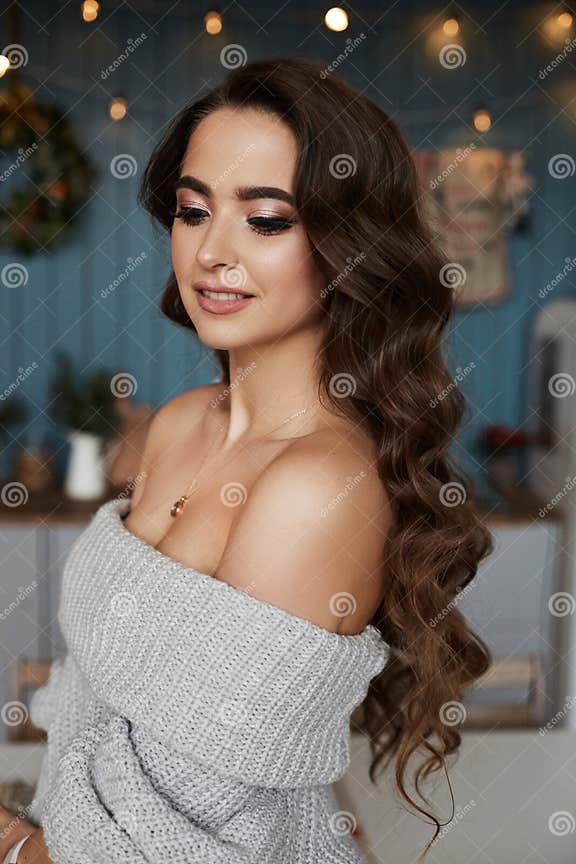 Sensual Brunette Model Girl With Perfect Body In Knitted Dress Posing