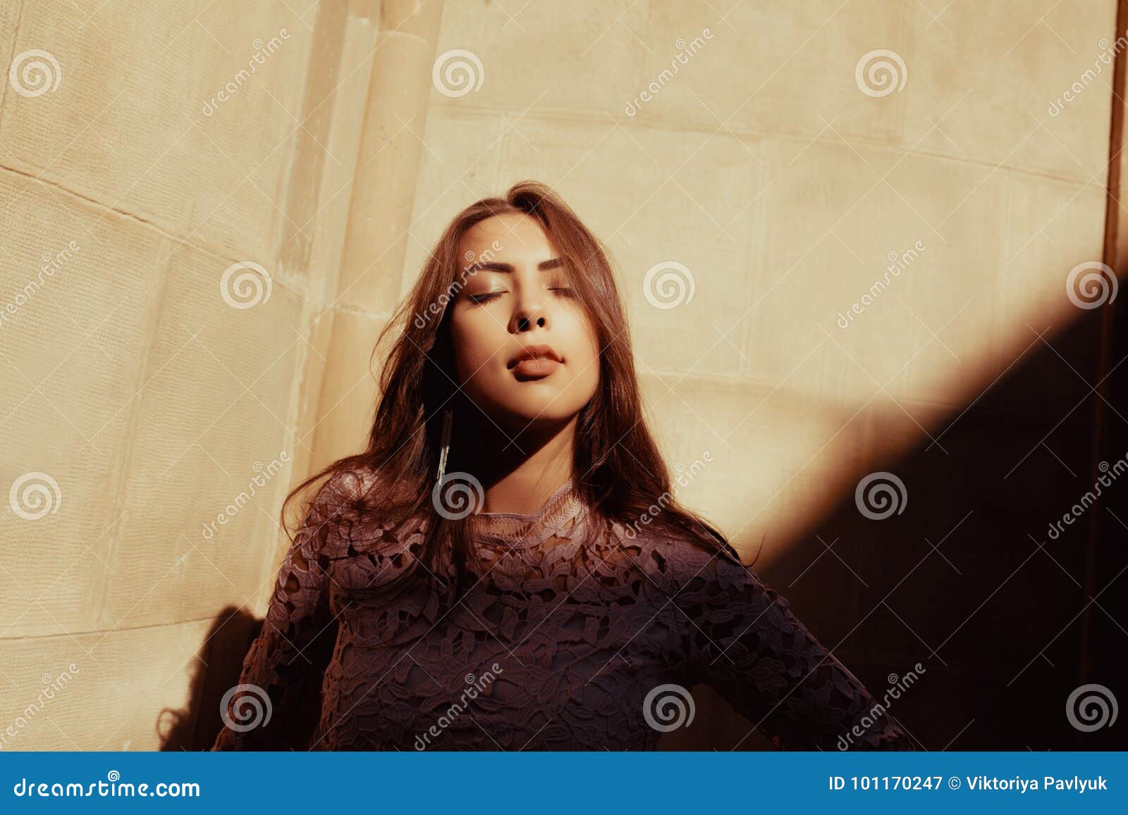 Sensual Brunette Model With Closed Eyes Posing At The Courtyard Stock