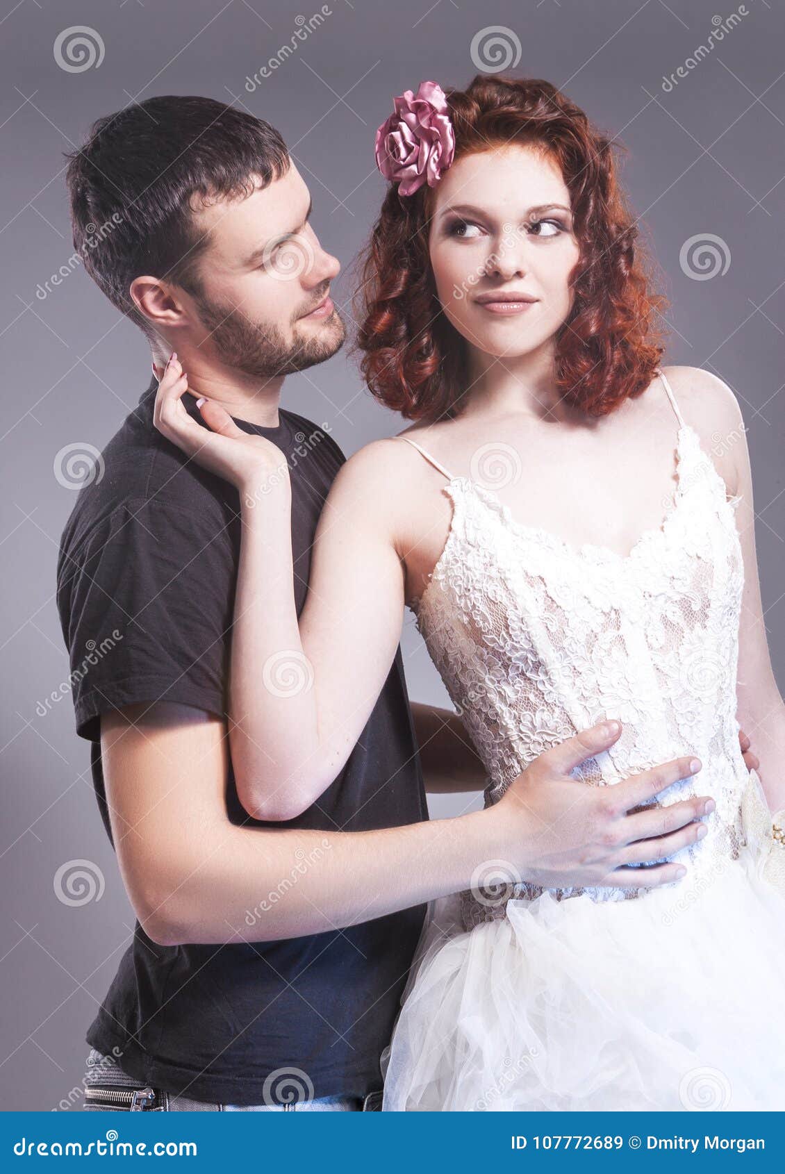 Sensual Caucasian Couple Of Posing Embraced Together And Touching Each
