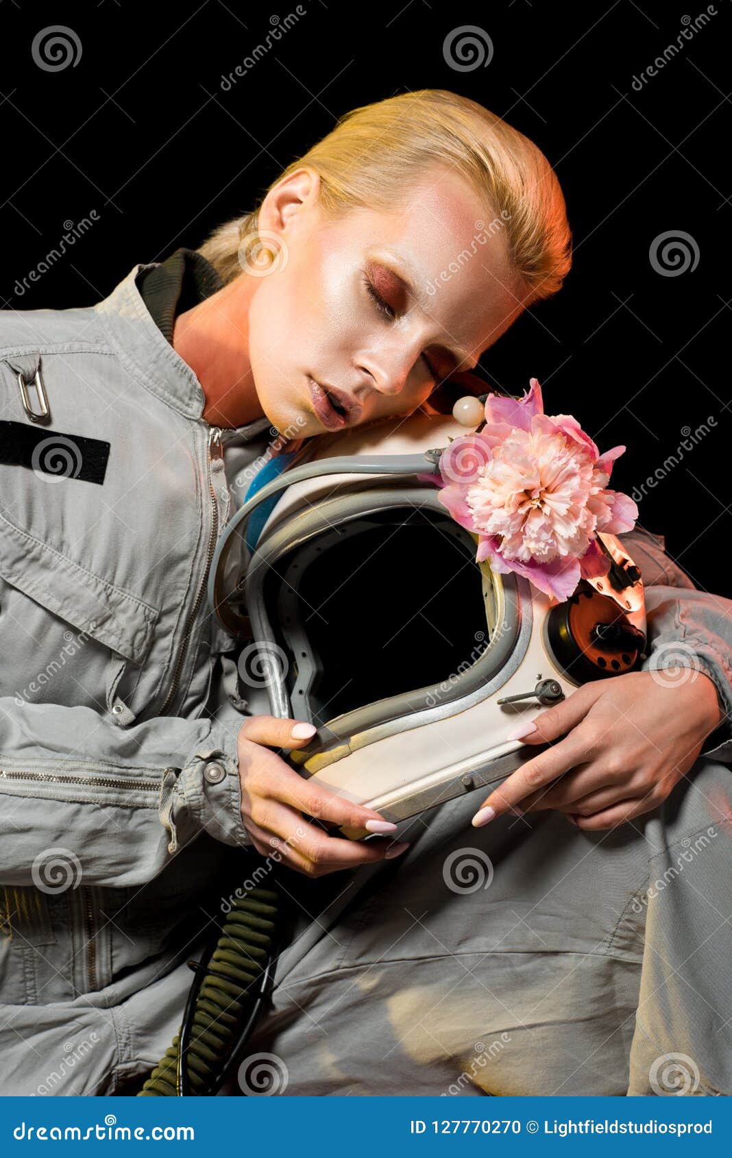 Sensual Female Astronaut in Spacesuit with Peony Flower and Helmet ... Sensual Female Astronaut in Spacesuit with Peony Flower and Helmet ...