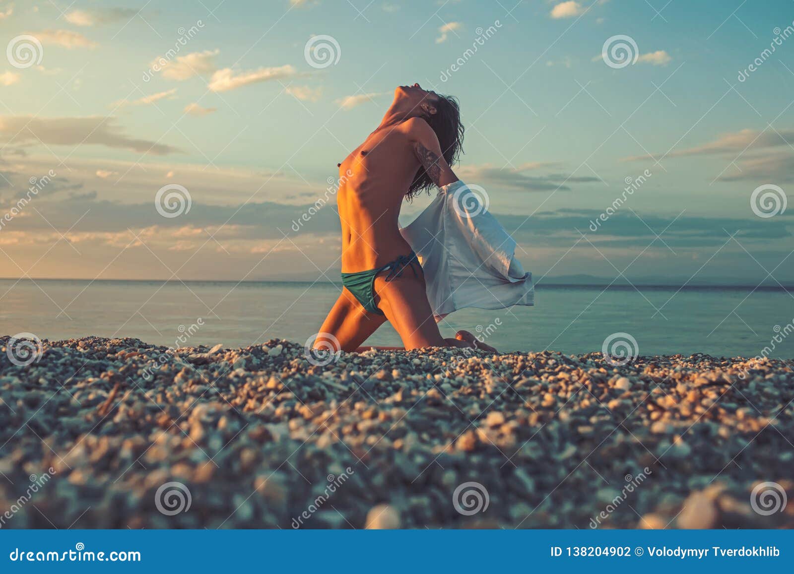 Sensual Girl with Body Relax on Beach. Girl with Naked Chest Sit on ... Sensual Girl with Body Relax on Beach. Girl with Naked Chest Sit on ...